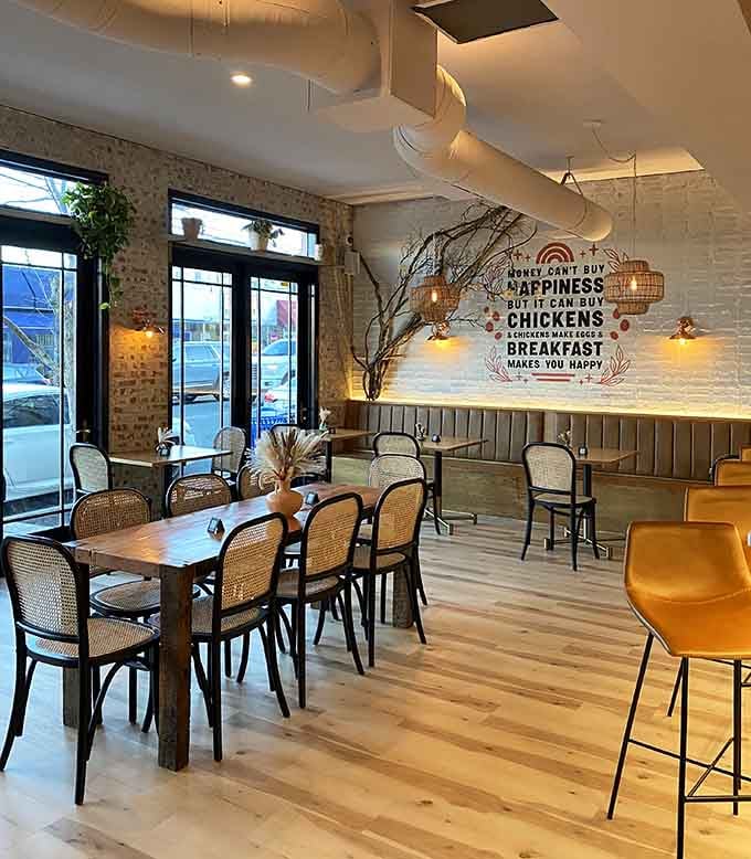 Step inside where exposed brick meets botanical bliss and that happiness-chickens-breakfast quote becomes your new life philosophy.