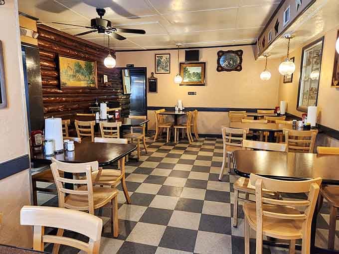 Classic checkered floors and wooden chairs create the kind of timeless diner atmosphere that Instagram could never replicate properly.