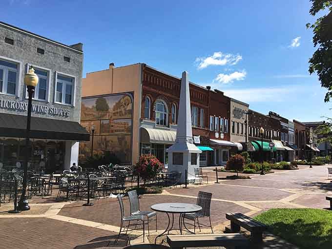 Outdoor seating that invites lingering conversations, proving downtown spaces can still prioritize humans over automobiles and profit margins.