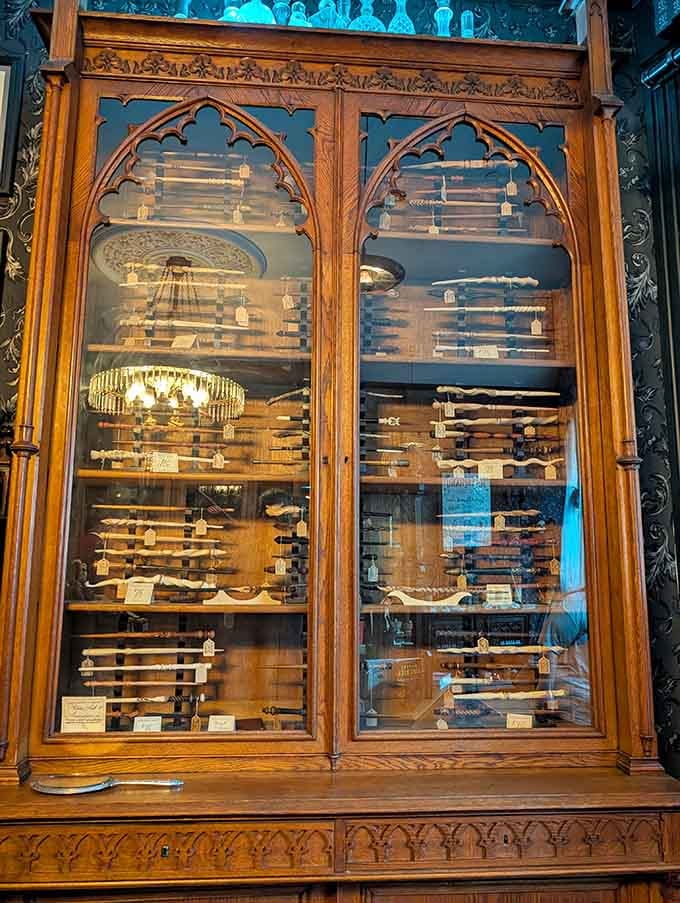 Behind Gothic arched glass, handcrafted wands wait like Excalibur, each one practically humming with possibility and artistry.
