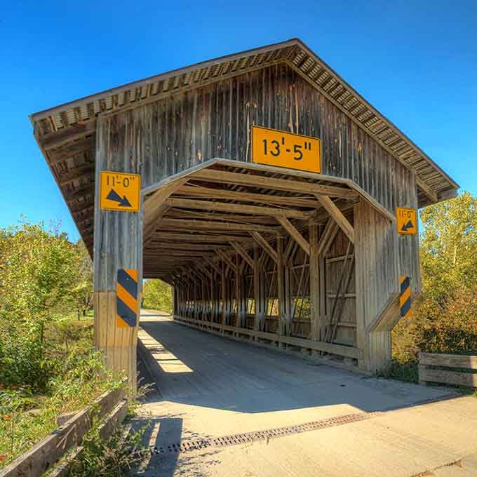 Those bright yellow clearance signs pop against the silvery wood like safety-conscious jewelry on a distinguished gentleman.