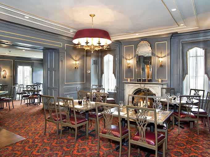 Elegant dining rooms where fireplaces crackle and history whispers from every corner of the space.