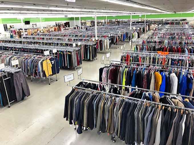Row after row of organized clothing racks stretch into the distance like a bargain hunter's dream come true.