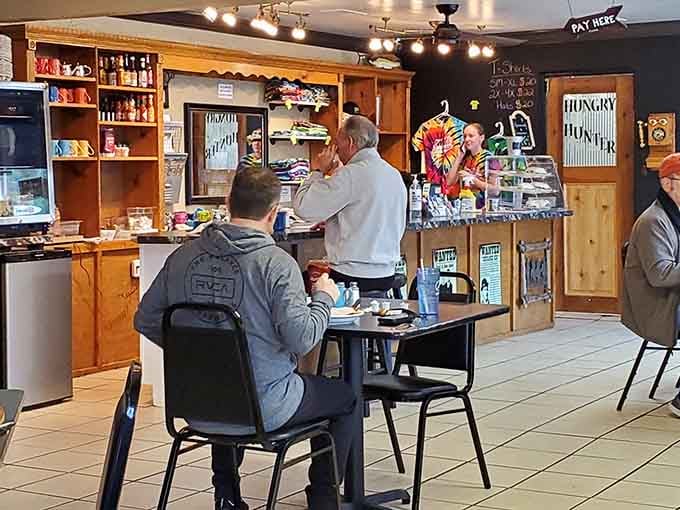 Wood paneling and friendly faces create the kind of breakfast atmosphere where strangers become regulars after one visit.