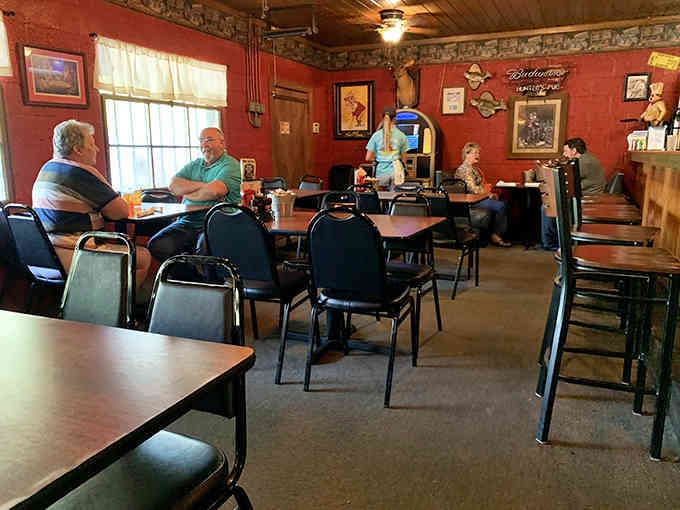 Red walls and hunting memorabilia create the perfect backdrop for serious steak eating and good conversation.