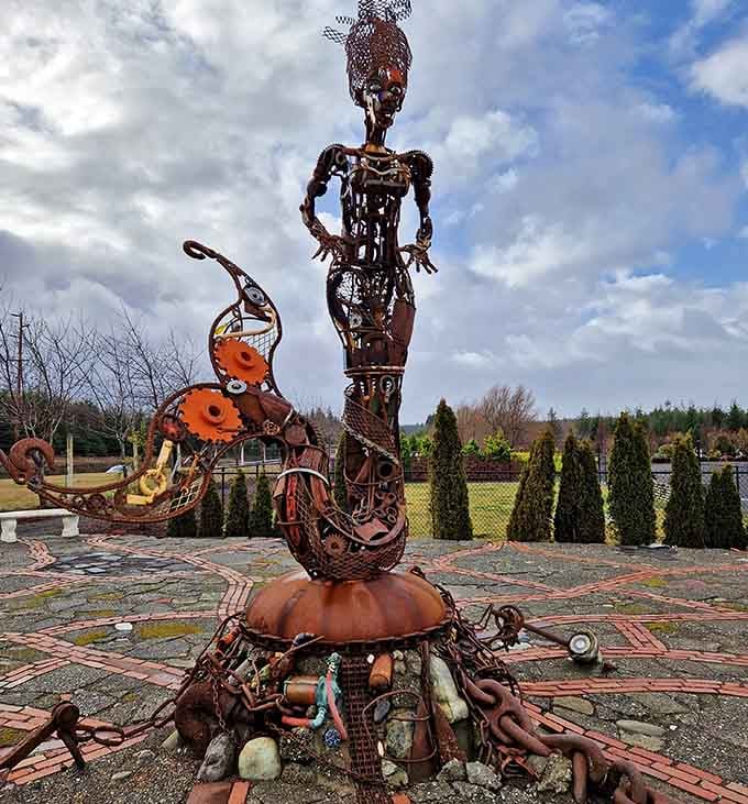 This towering metal mermaid sculpture proves that one person's scrap pile is another person's underwater masterpiece.