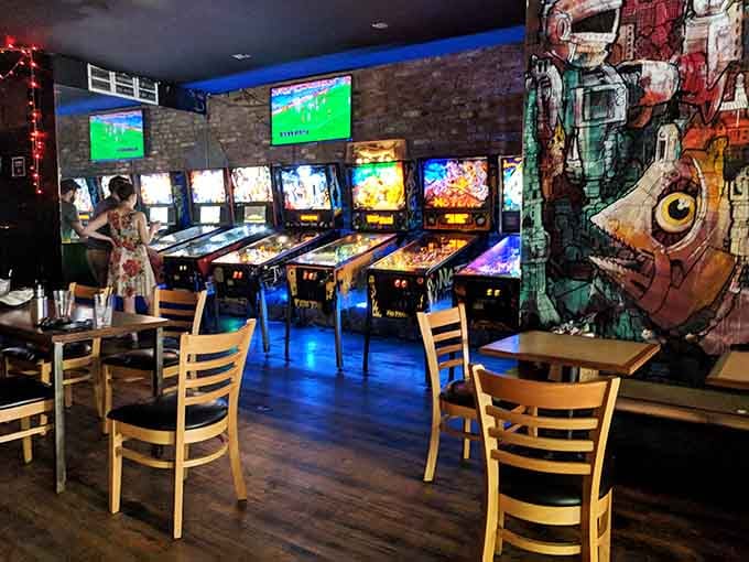 Rows of glowing pinball machines stand ready like soldiers of fun, waiting to challenge your reflexes and patience.