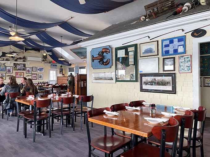 Nautical touches and local photographs create an atmosphere that feels authentically coastal, never contrived or touristy.