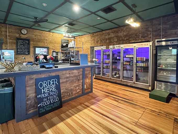 Wood-paneled walls and refrigerators full of local goodies create the perfect blend of rustic charm and culinary sophistication.