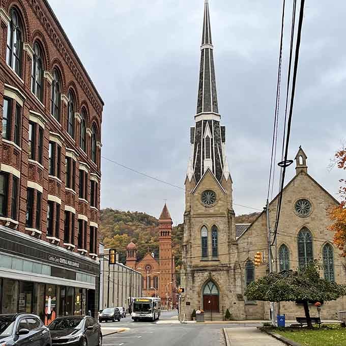 Church spires and historic buildings create a skyline that tells stories, not just blocks out the sun like modern cities.