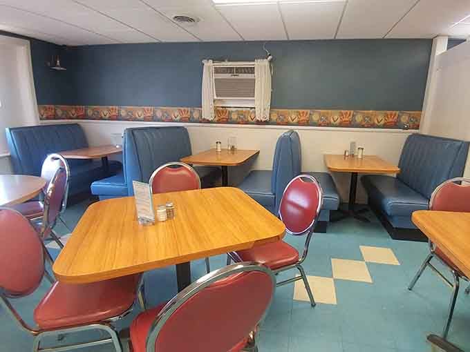 Classic diner booths and retro vibes create the perfect setting for serious comfort food consumption and conversation.