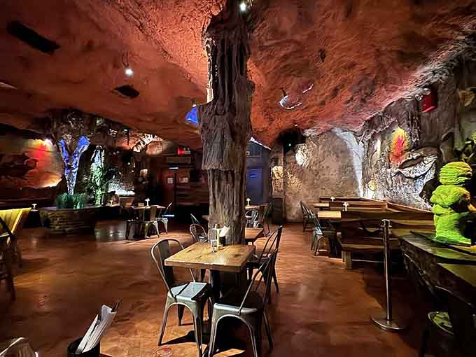 Dining inside what appears to be the world's most ambitious art installation, complete with actual tree trunks for atmosphere.