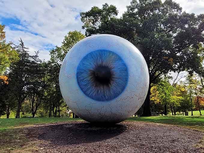 Nothing says "welcome to art" quite like a massive eyeball watching your every move through the trees.