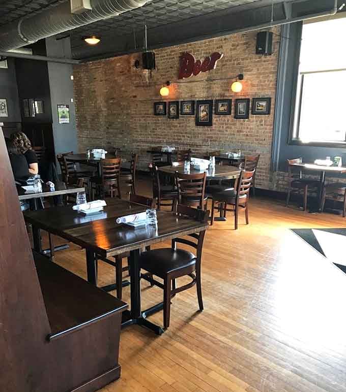Exposed brick, hardwood floors, and pendant lighting create the kind of tavern atmosphere that makes you want to stay awhile.