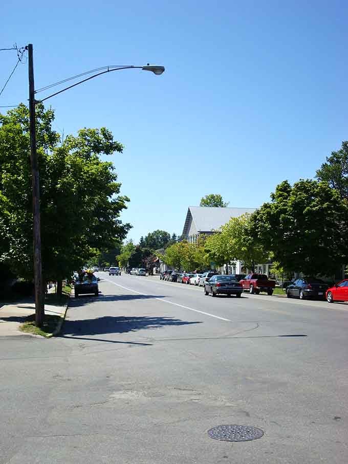 Tree-lined streets where the biggest traffic jam involves deciding which ice cream shop to visit first.