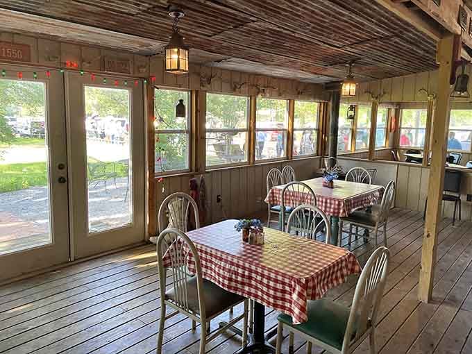 Red checkered tablecloths and wooden walls create the kind of cozy atmosphere where calories don't count and stress melts away.