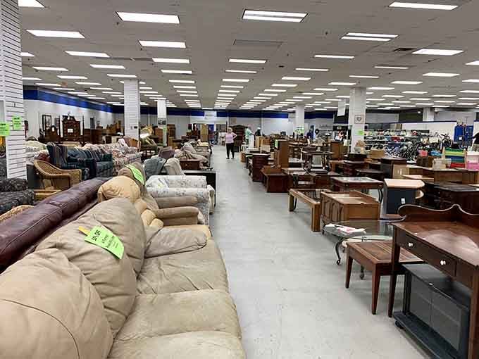 Rows of furniture stretch endlessly like a showroom that forgot to charge showroom prices for quality pieces.