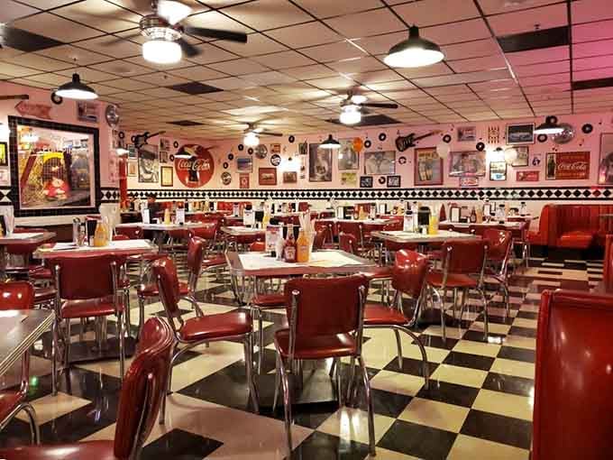 Red vinyl booths and checkered floors create the perfect backdrop for serious milkshake consumption and burger appreciation.