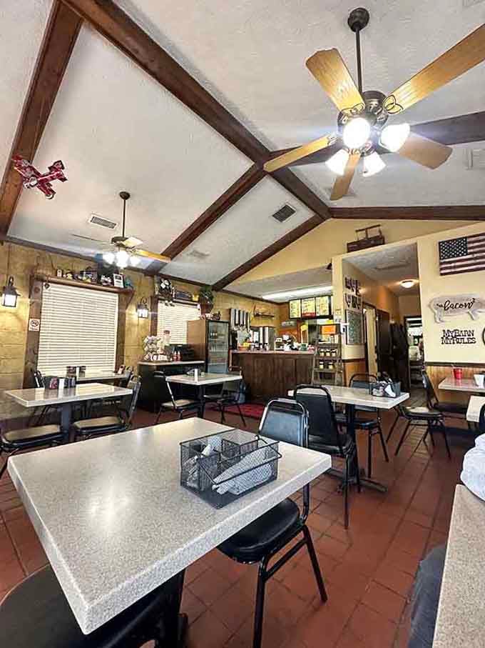 Step inside where exposed beams and Americana charm create the perfect backdrop for serious Southern comfort food.