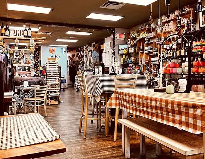 Checkered tablecloths and shelves packed with personality create the kind of cozy atmosphere that makes you want to stay awhile.