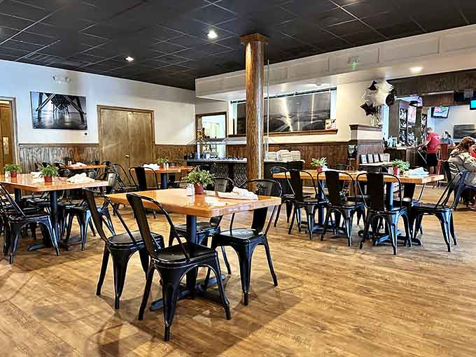 Wood tones meet industrial chic in a space that welcomes flip-flops and date nights with equal enthusiasm.