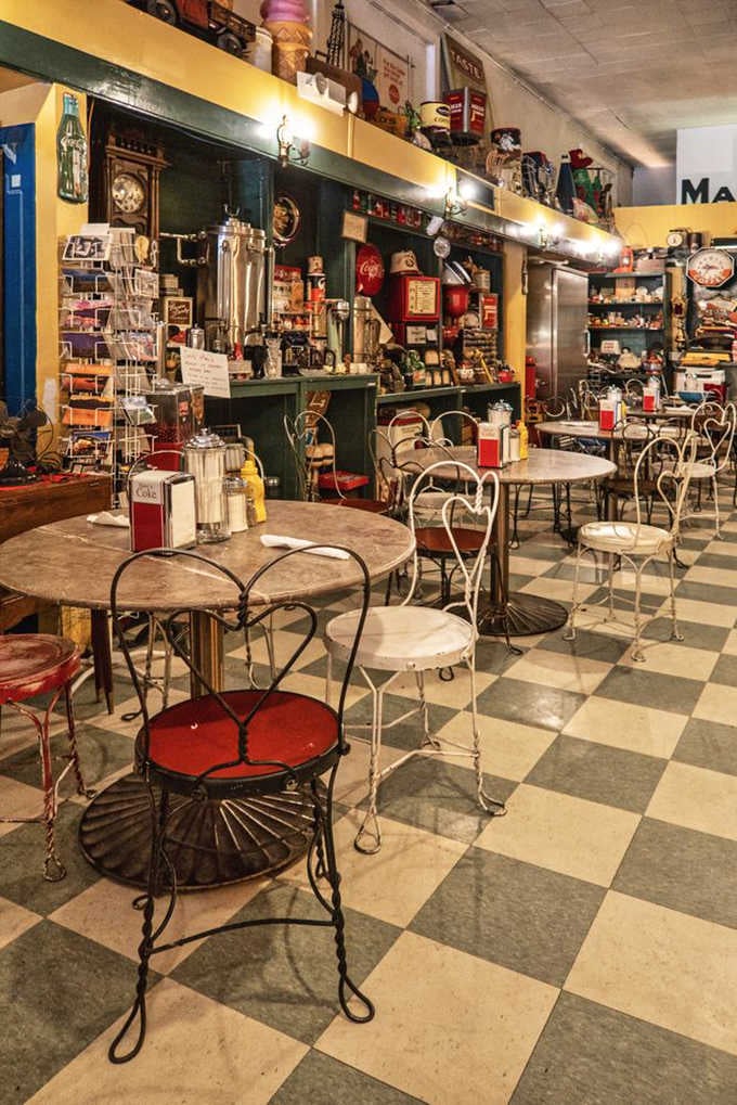 Checkered floors and vintage treasures create a museum you can actually eat in, minus the velvet ropes.