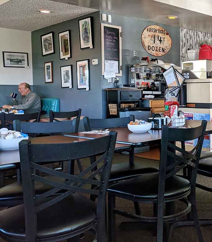 Cozy booths, local art on the walls, and that vintage "Fresh Eggs" sign promising exactly what you're hoping for.