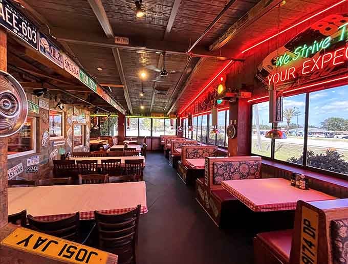 Inside, every surface tells a story, and those red checkered tablecloths promise serious comfort food ahead.