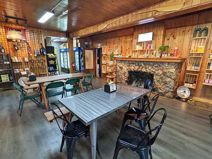 Wood paneling and a stone fireplace create the kind of cozy atmosphere that makes you want to order seconds just to stay longer.