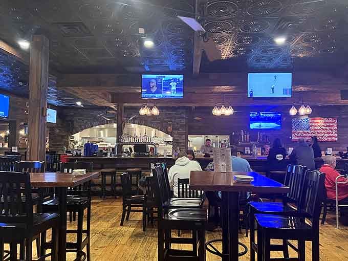 Wood beams, warm lighting, and TVs everywhere create the perfect spot for tacos and touchdowns alike.