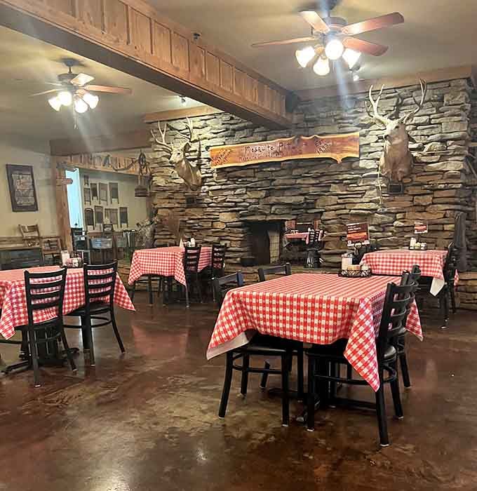 Red checkered tablecloths, mounted trophies, and a stone fireplace create the coziest carnivore's paradise this side of the Brazos.
