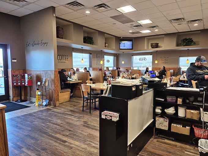 Wood tones, cozy booths, and pendant lighting create the kind of breakfast sanctuary your soul craves.
