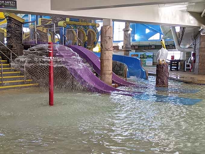 Purple slides and tropical theming prove that indoor waterparks don't have to sacrifice style for function.