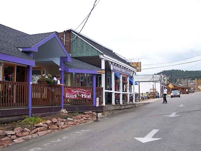 Purple buildings and outdoor patios where mountain charm meets bohemian spirit in the most delightful way possible.