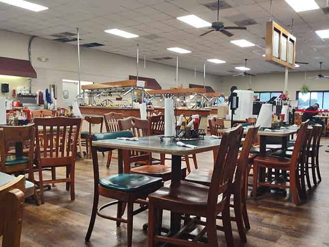 Spacious dining room with comfortable seating where nobody rushes you through your third trip to the buffet line.