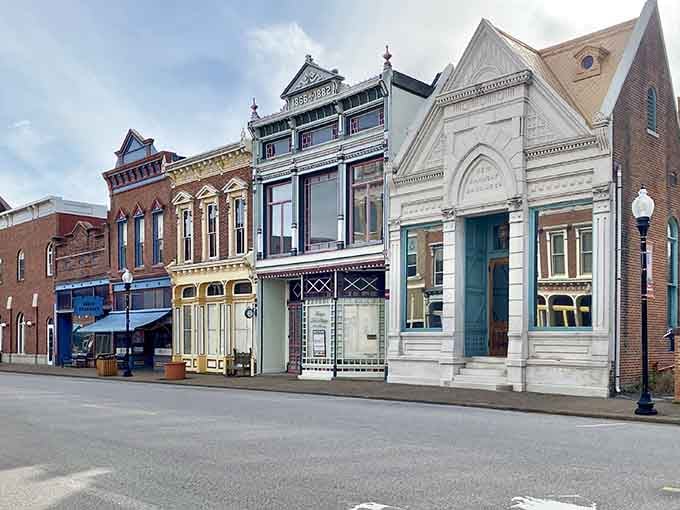 These colorful storefronts prove that historic preservation doesn't have to mean boring, just beautifully maintained architectural eye candy.