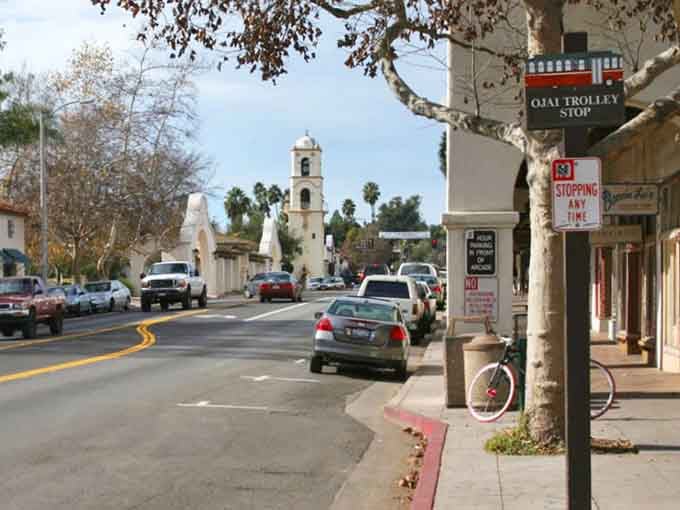Downtown Ojai's Spanish arcade provides shade for browsing, because even window shopping deserves architectural charm and protection from the sun.