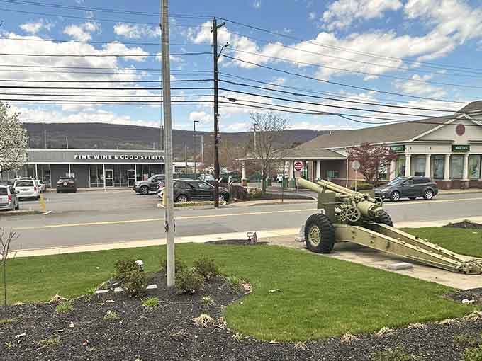 That military cannon isn't for show; it's protecting the town's most valuable asset: world-class pizza recipes.