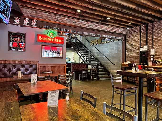 Exposed brick, vintage beer signs, and a staircase to more seating? This place gets tavern ambiance perfectly right.