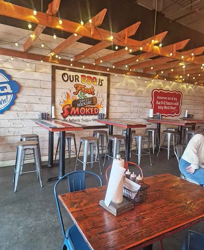 String lights and wooden beams create the perfect atmosphere for contemplating life's important questions, like more ribs?