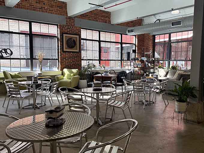 Exposed brick, natural light, and cozy seating create the perfect atmosphere for lingering over your morning coffee.