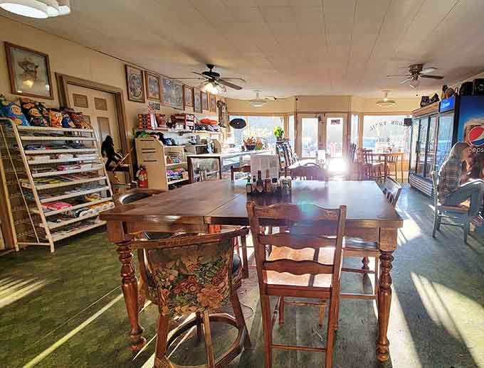 Step inside where mismatched chairs and warm lighting create the coziest mountain hideaway you never knew existed.