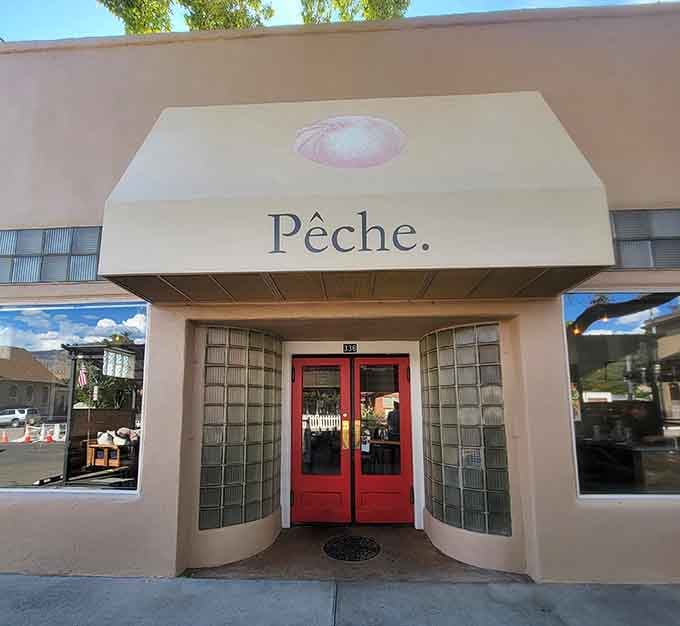P&ecirc;che's charming entrance promises culinary adventures that'll make your taste buds write thank-you notes afterward.
