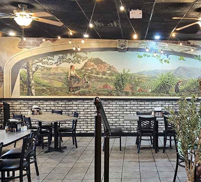 Step inside and find yourself transported to the Italian countryside, complete with rolling hills painted across the walls.