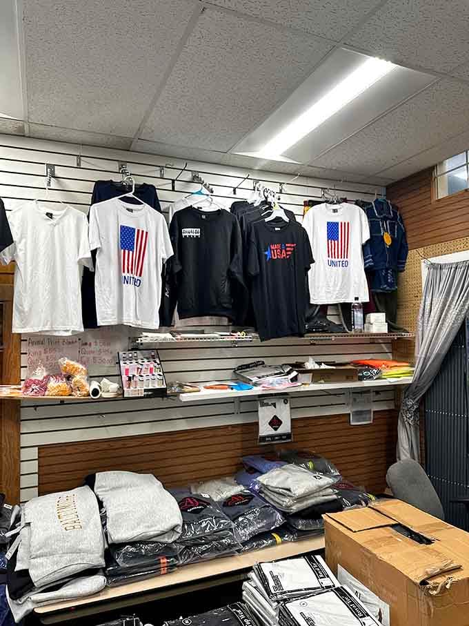 Patriotic apparel stacked high on wooden shelves, because nothing says America quite like affordable fashion finds.
