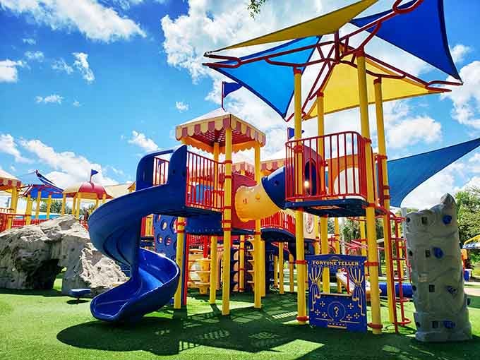 This isn't your average slide, it's a portal to pure joy wrapped in circus colors and childhood dreams.