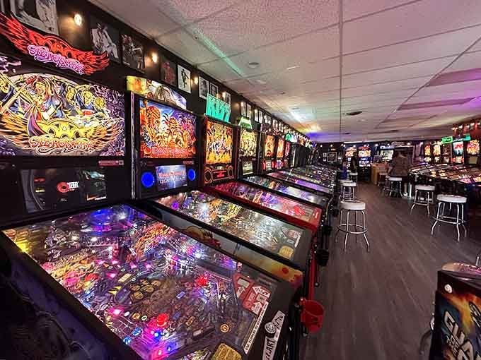 Those backlit glass panels create an atmosphere that's pure arcade magic from the golden age.