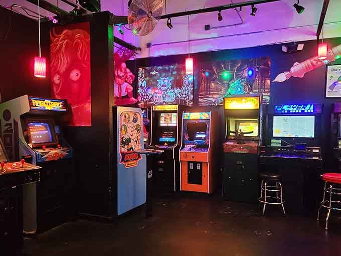 Neon lights and classic cabinets create the perfect atmosphere for reliving your arcade glory days with style.