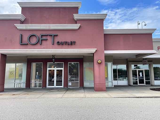 The pink facade of LOFT proves that outlet shopping can be both stylish and budget-friendly in equal measure.