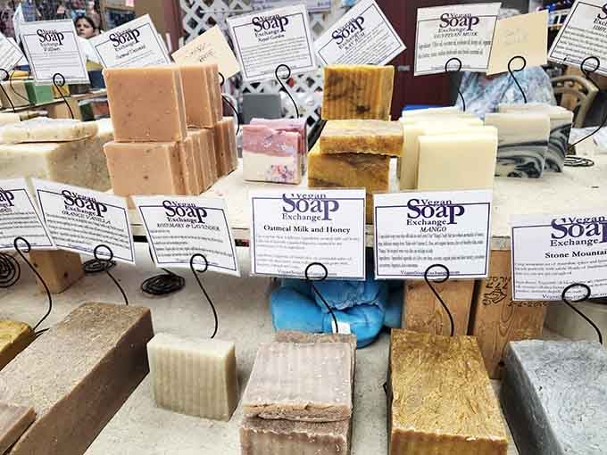 Handcrafted soaps lined up like colorful soldiers, each one promising to make your shower feel like a spa retreat.